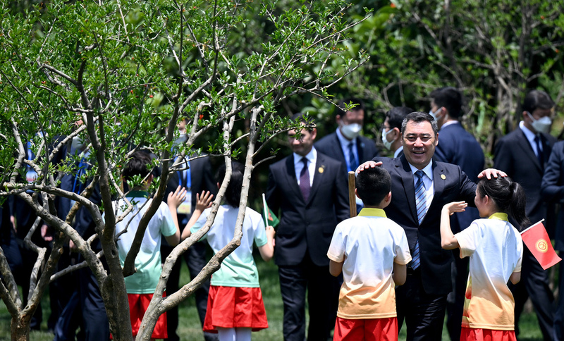 Central Asian Leaders And Xi Jinping Plant Trees In Friendship Alley In